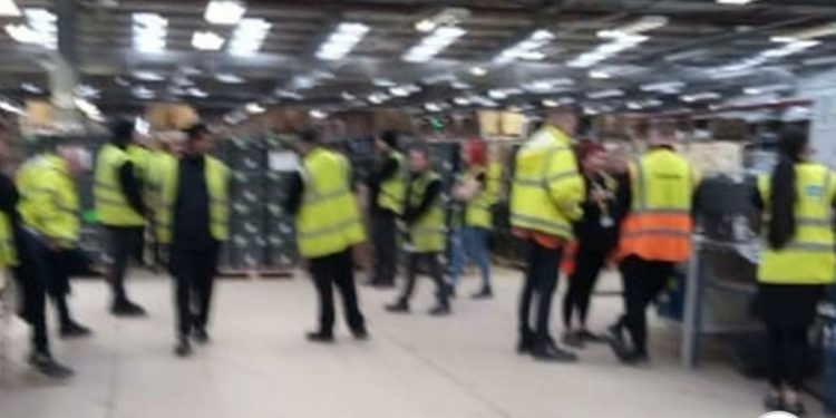 Inside the JD Sports warehouse where 'thousands' of people are still ...